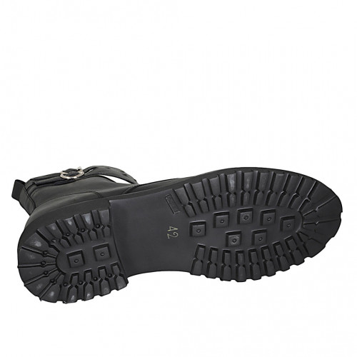 Woman's laced ankle boot with zipper, studs and buckles in black ...